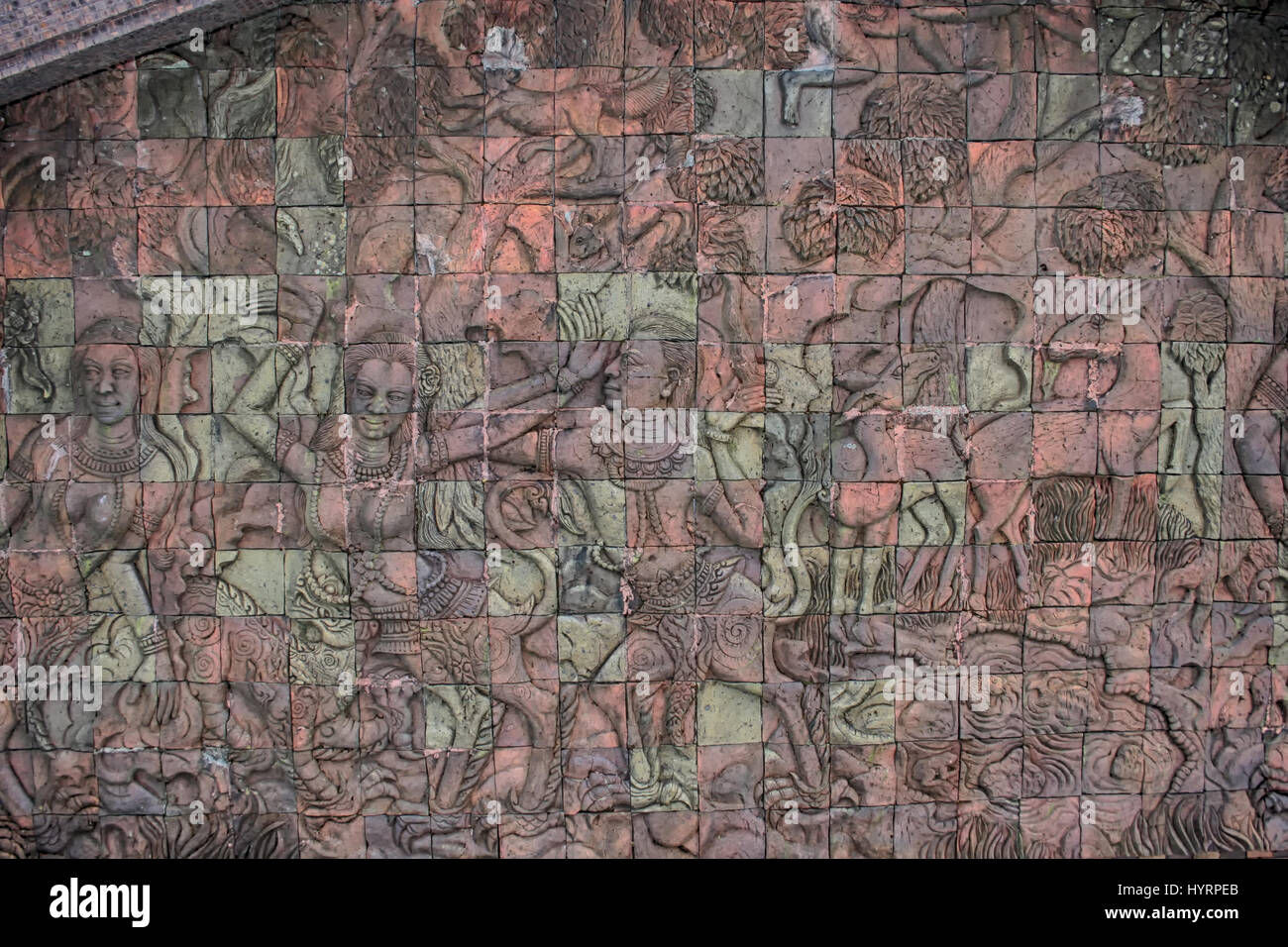 Ornate tile mural wall at Buddhist shrine in Northern Thailand Stock ...