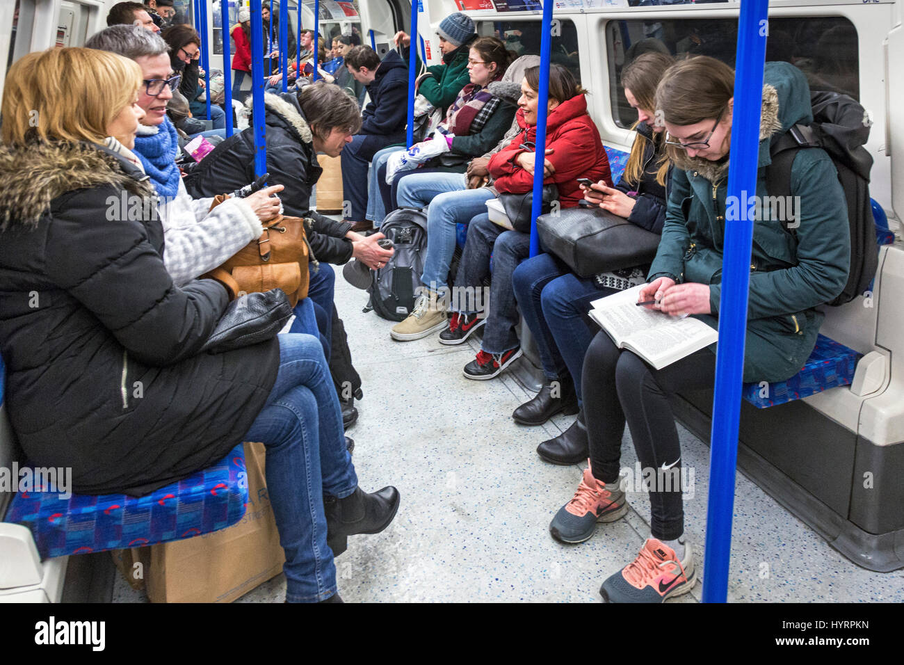 Passengers on London Underground Tube system, England, UK Stock Photo ...