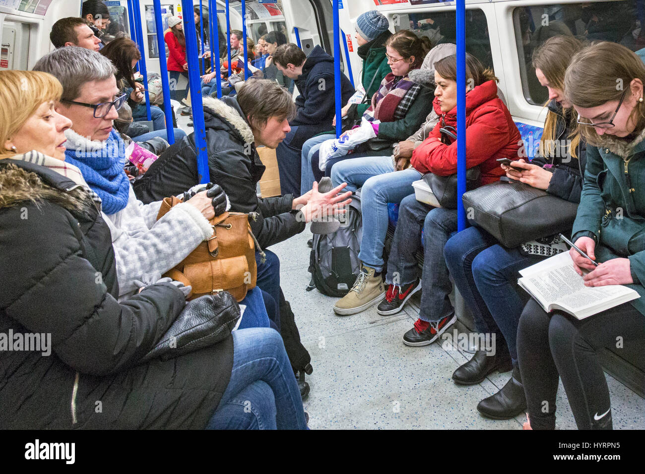Passengers on London Underground Tube system, England, UK Stock Photo ...