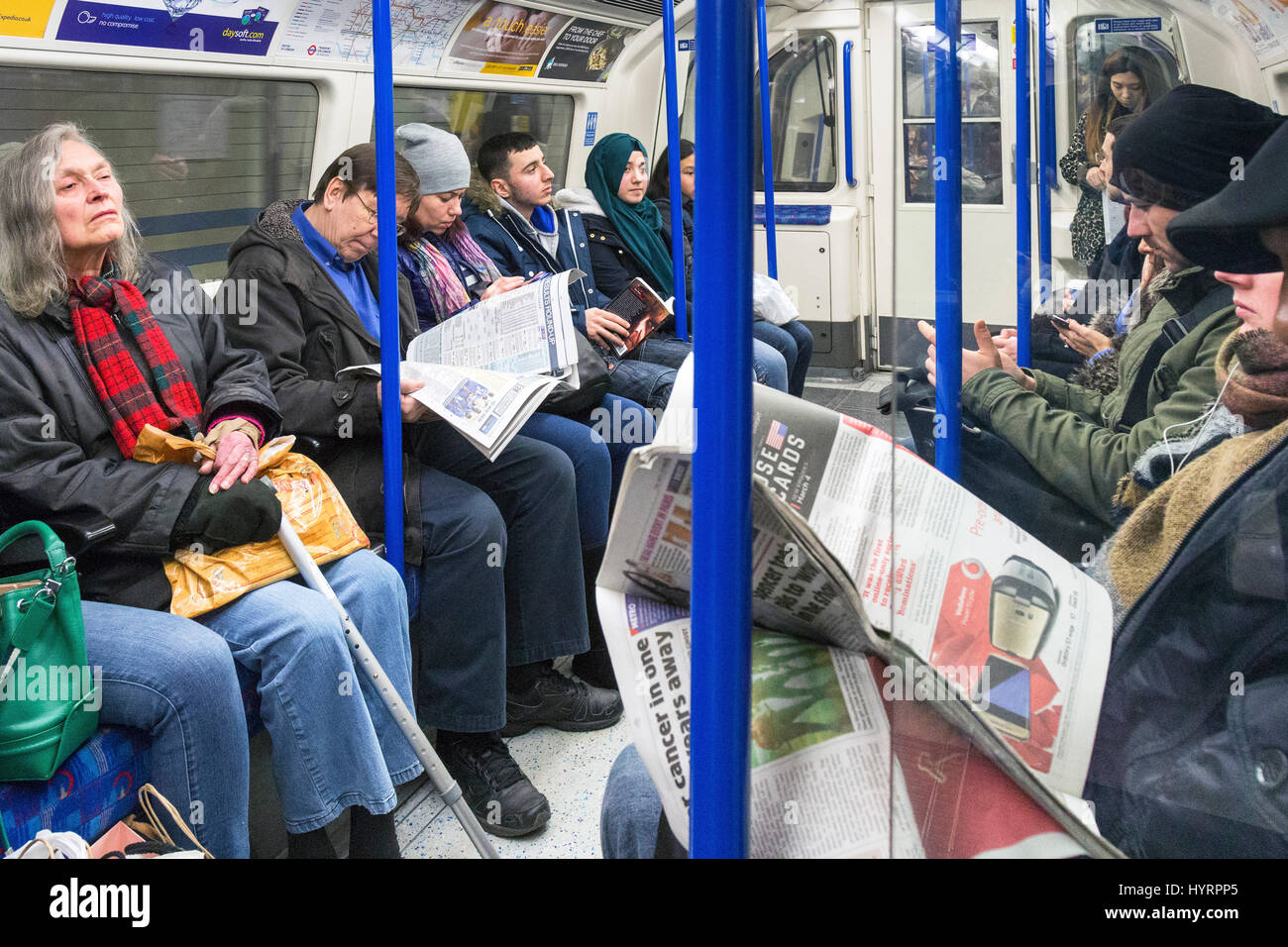 Passengers on London Underground Tube system, England, UK Stock Photo ...