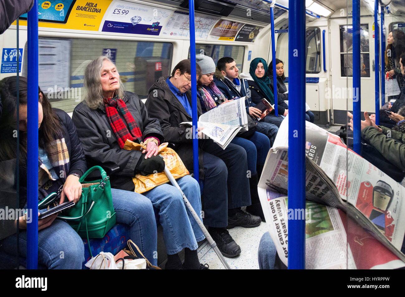 Passengers on London Underground Tube system, England, UK Stock Photo ...