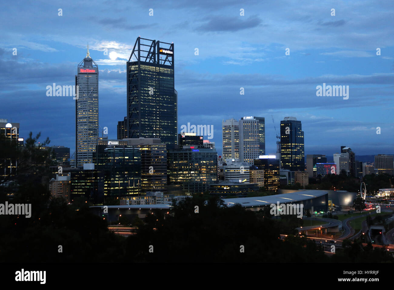 The full moon rises over the buildings in Perth, Australia Stock Photo ...