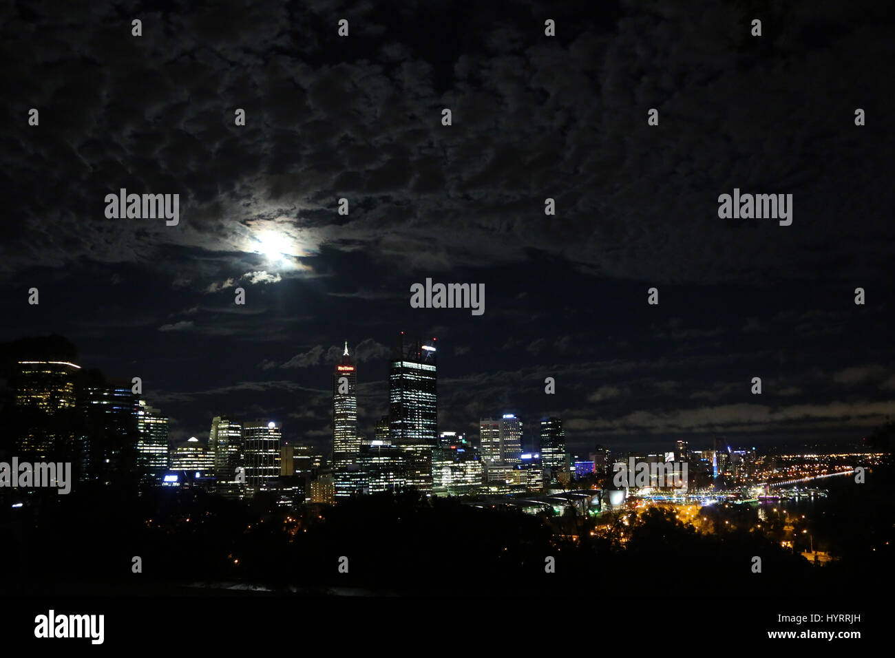 The full moon rises over the buildings in Perth, Australia Stock Photo ...
