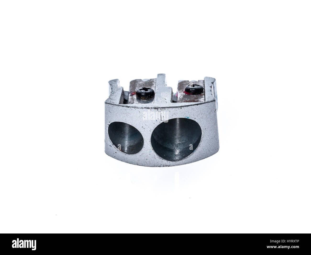 Old used silver metallic steel pencil sharpener isolated on white ...