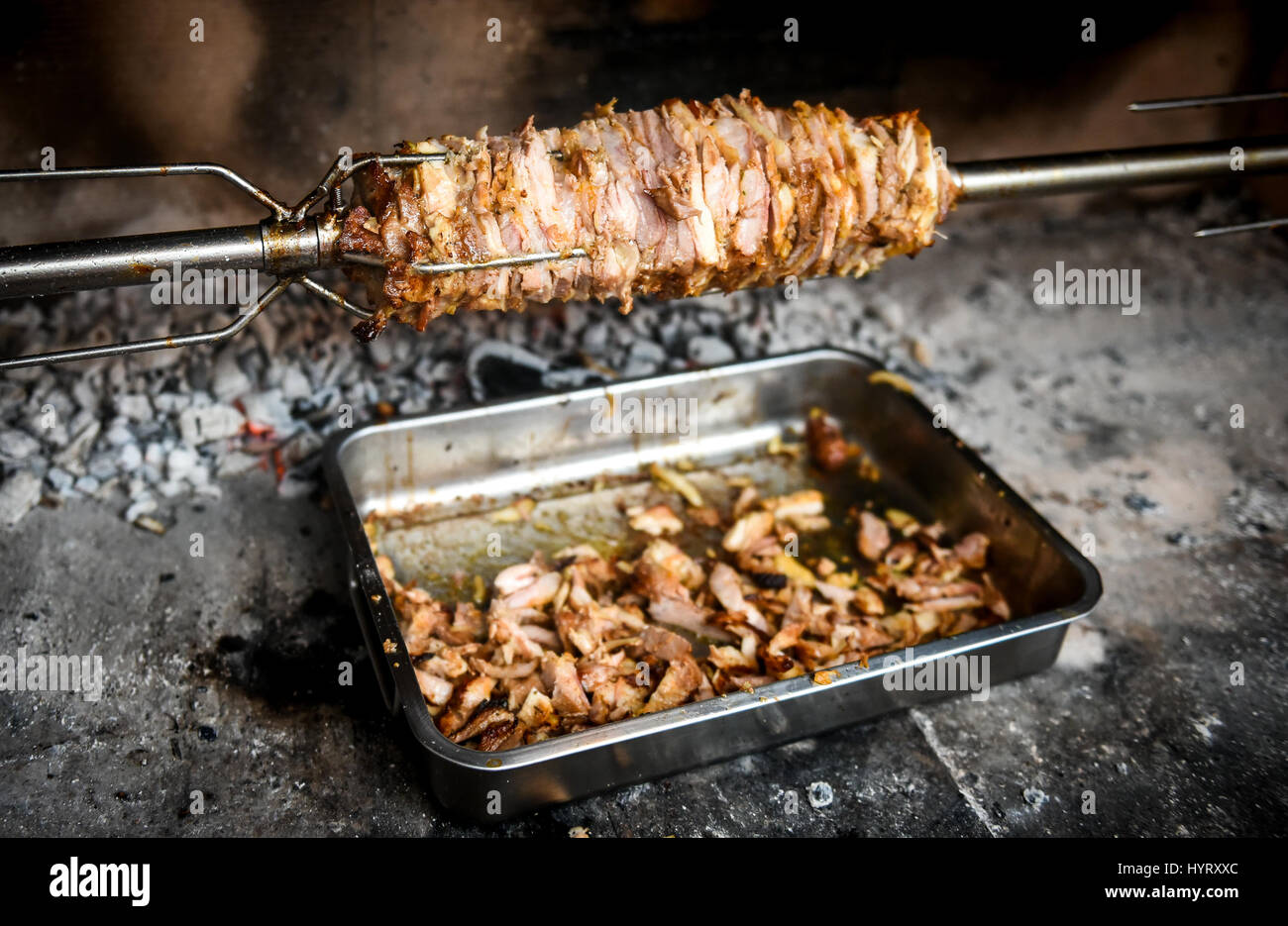 Making home made cag kebab gyros with fire and charcoal. Cağ or döner ...