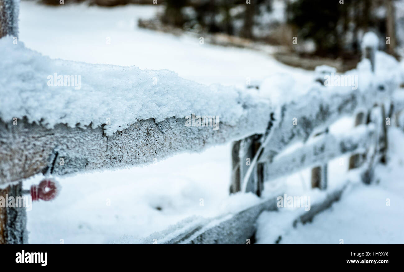 Winter country landscape with frozen timber - wooden fence. Snow ...
