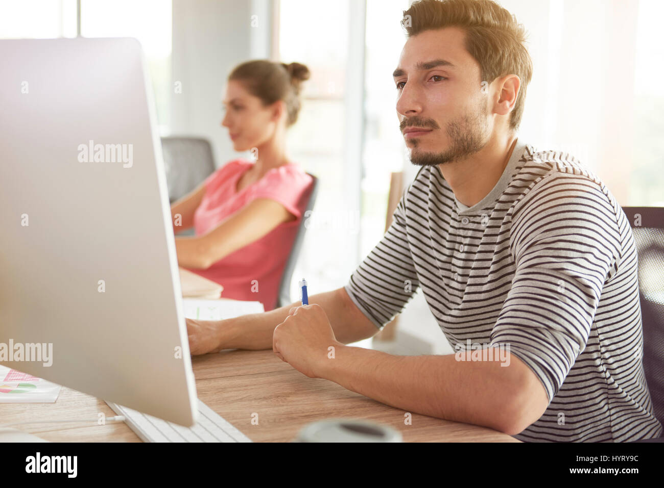 Man very focused on his work Stock Photo - Alamy