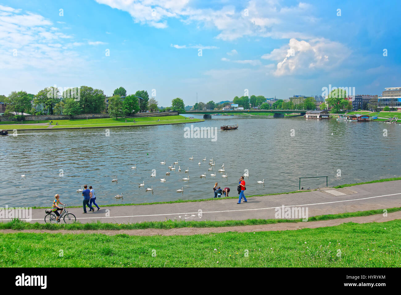 Krakow, Poland - May 1, 2014: People at the embankment of Visla River ...