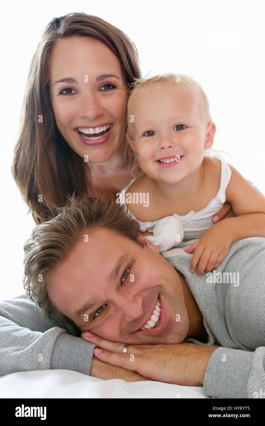 Close up portrait of a happy family smiling together Stock Photo - Alamy