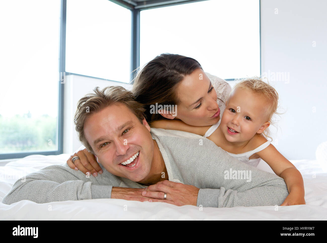 Small family together home hi-res stock photography and images - Alamy