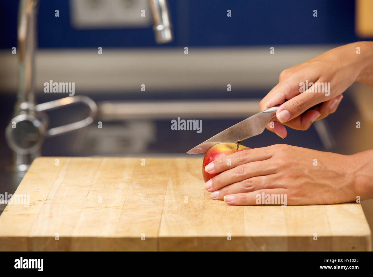 Woman cutting apple on hi-res stock photography and images - Alamy