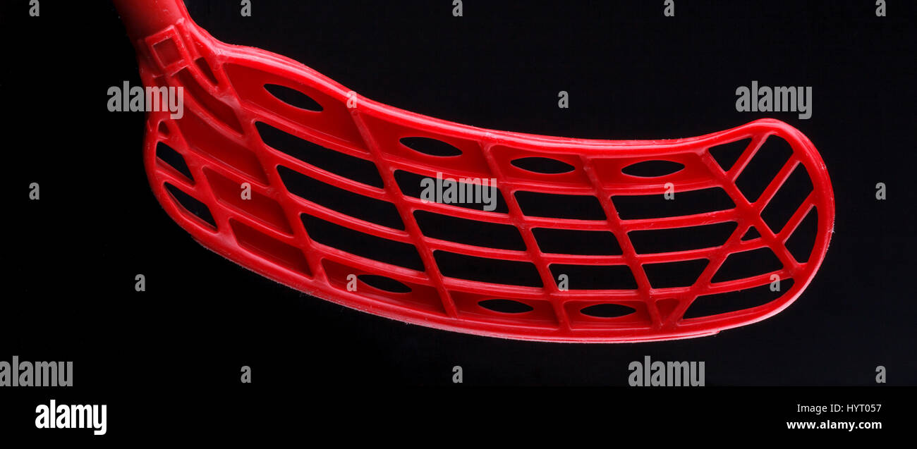 Red floorball stick blade isolated on black background Stock Photo - Alamy