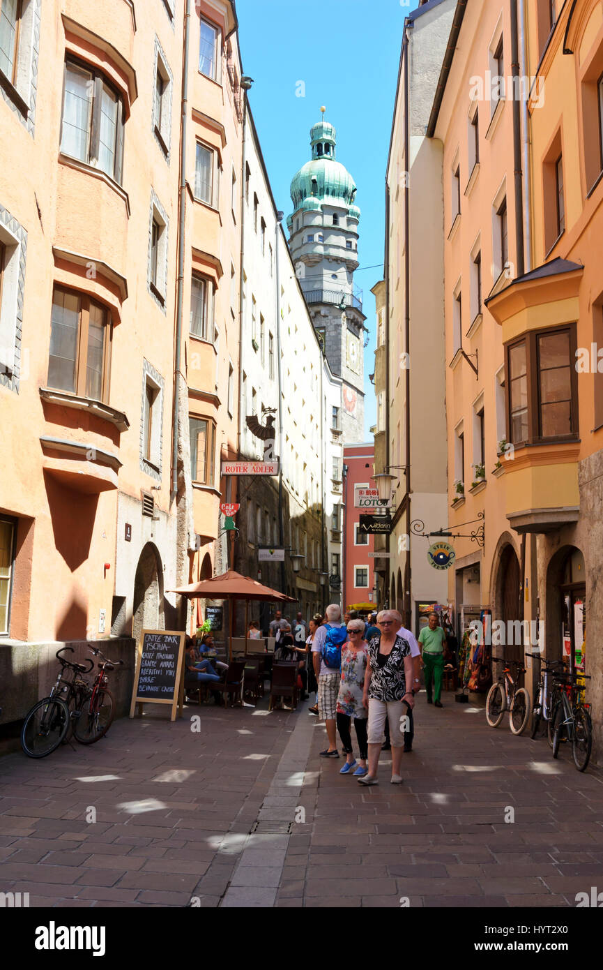 A narrow street with rows of shops, Innsbruck, Austria Stock Photo - Alamy