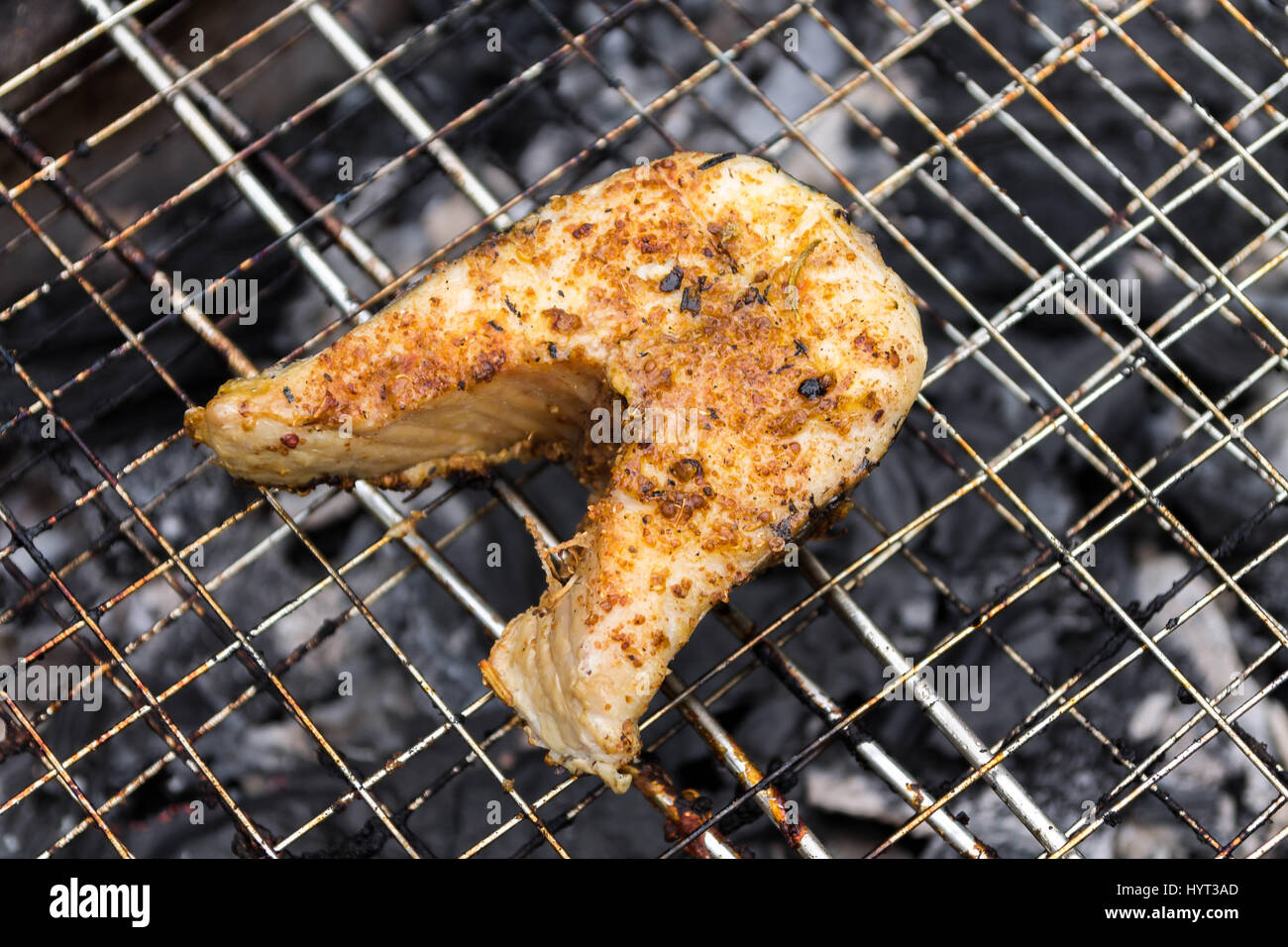 Cooking fish. Barbecue. Fish steak. BBQ with fish Stock Photo - Alamy