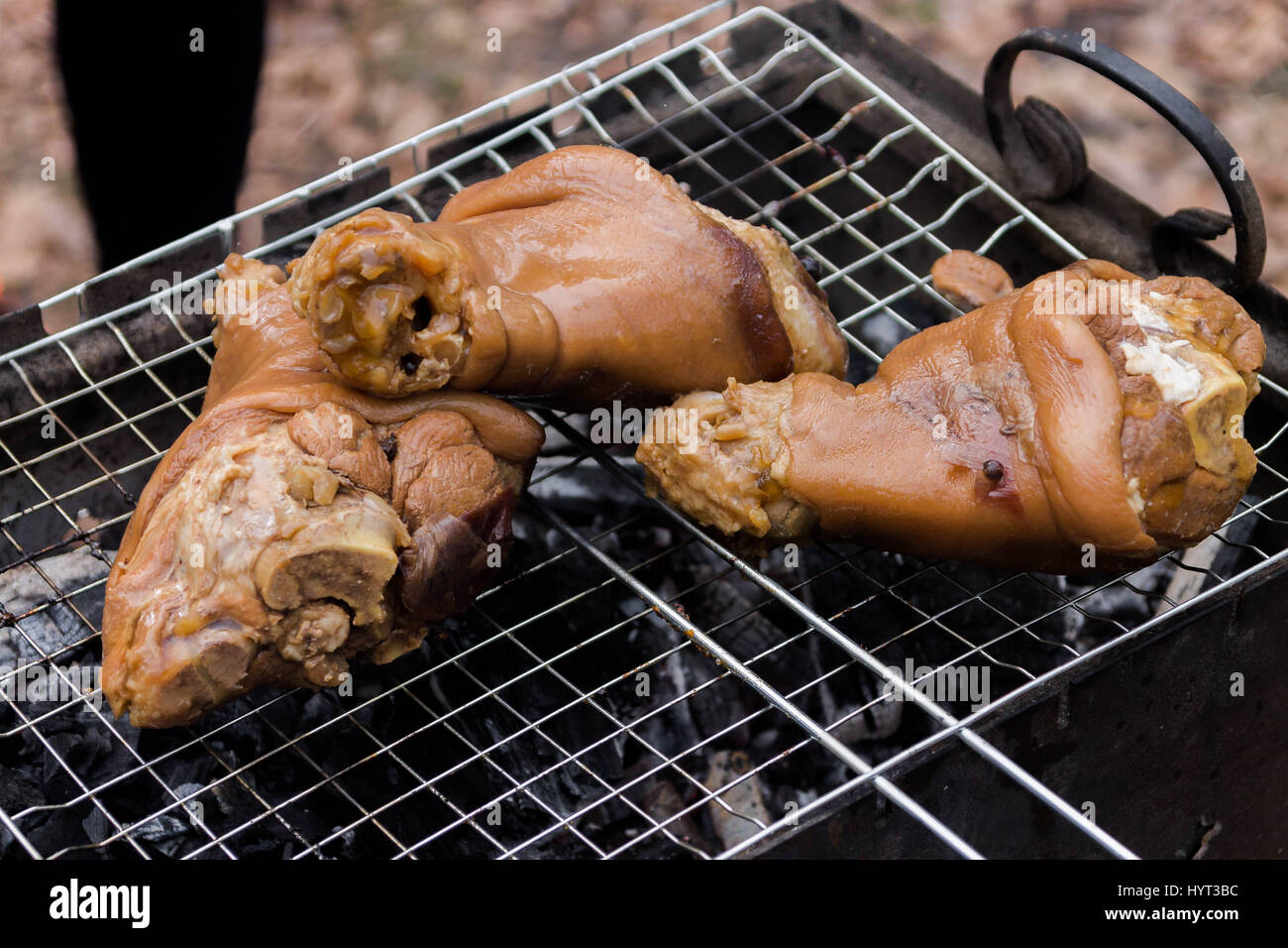 Pork shin on the grill. Meat. Barbecue. Eating outdoors Stock Photo - Alamy