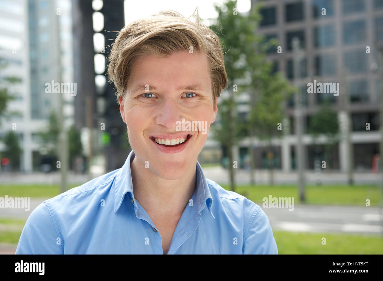 Stylish young man posing standing hi-res stock photography and images ...