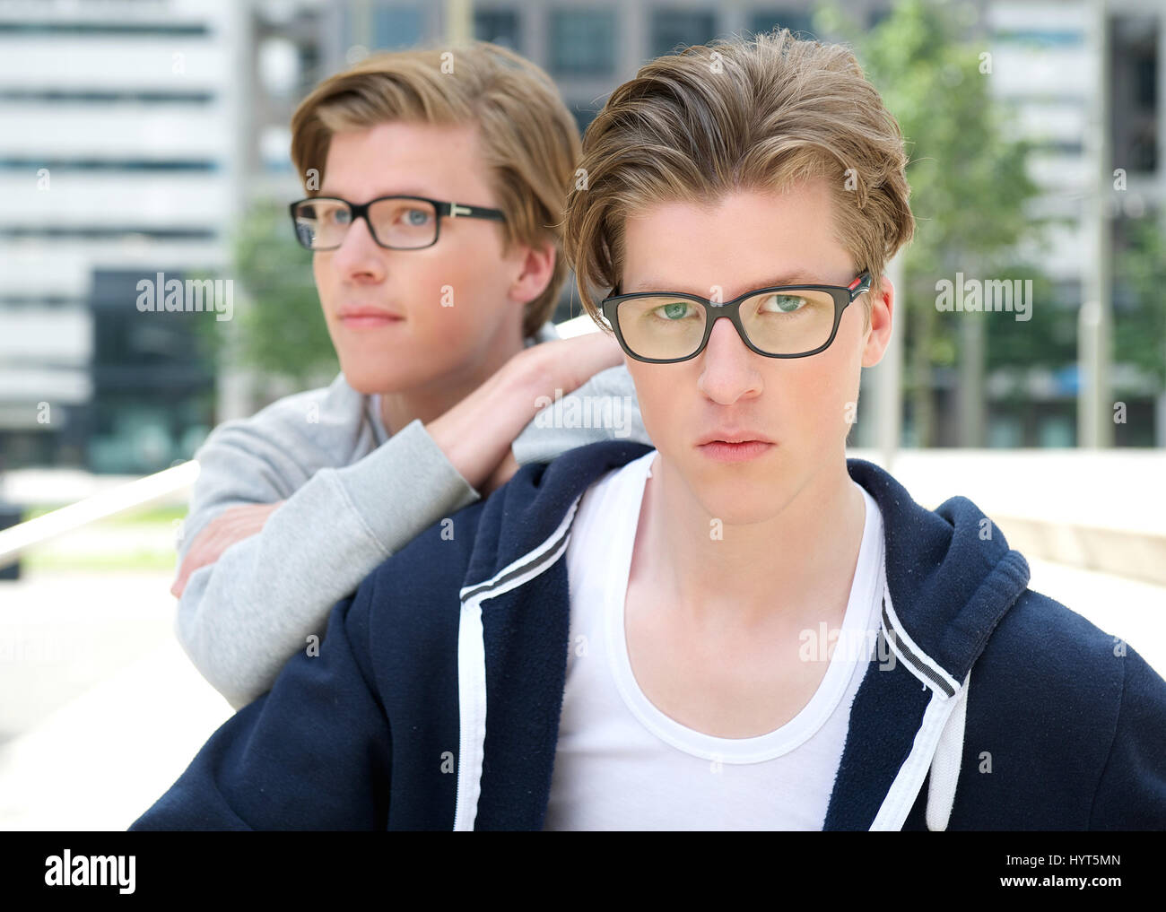Two young handsome brothers posing hi-res stock photography and images ...