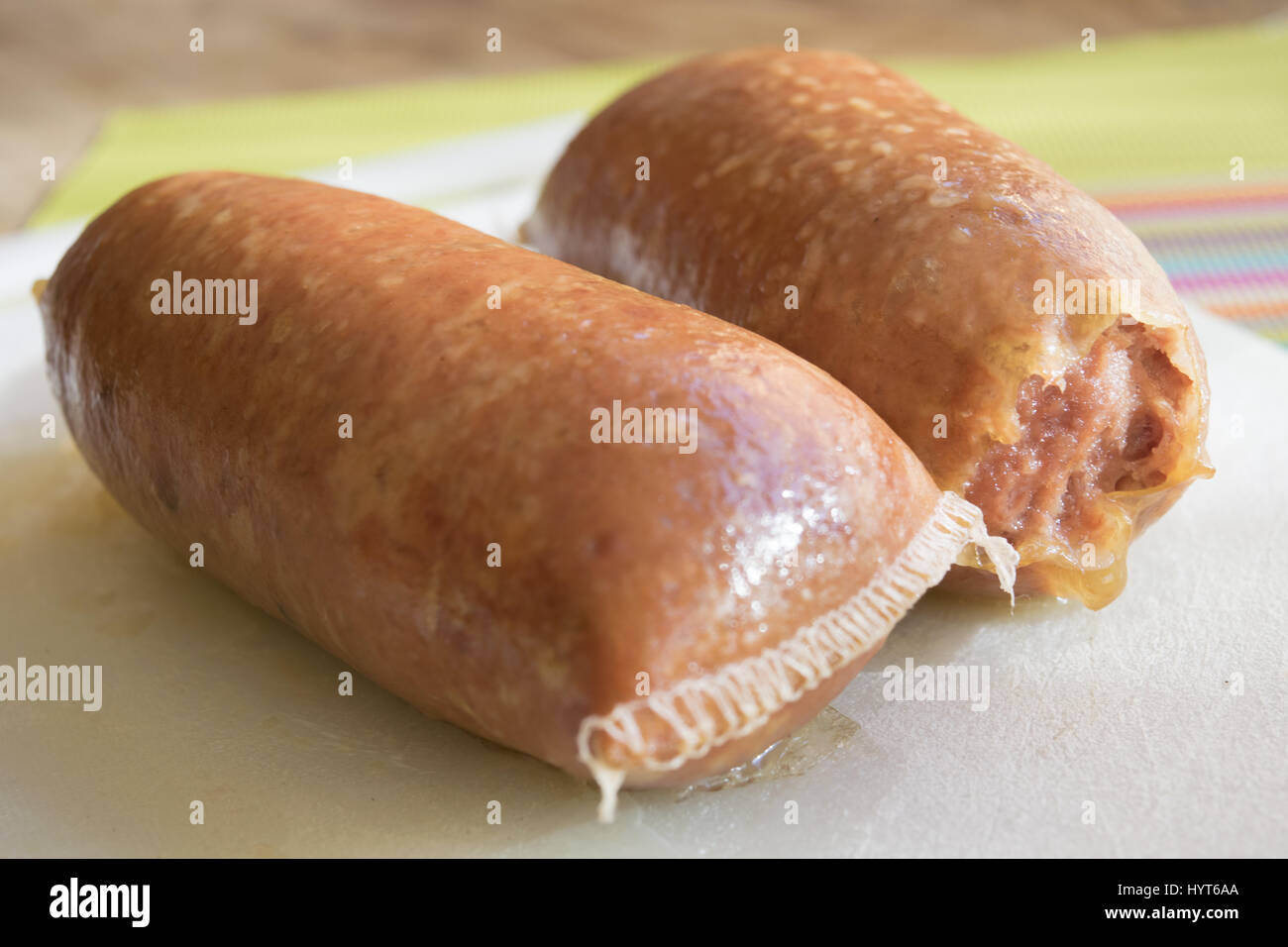 Italian cotechino or gelatinous pork sausage in a natural casing Stock ...