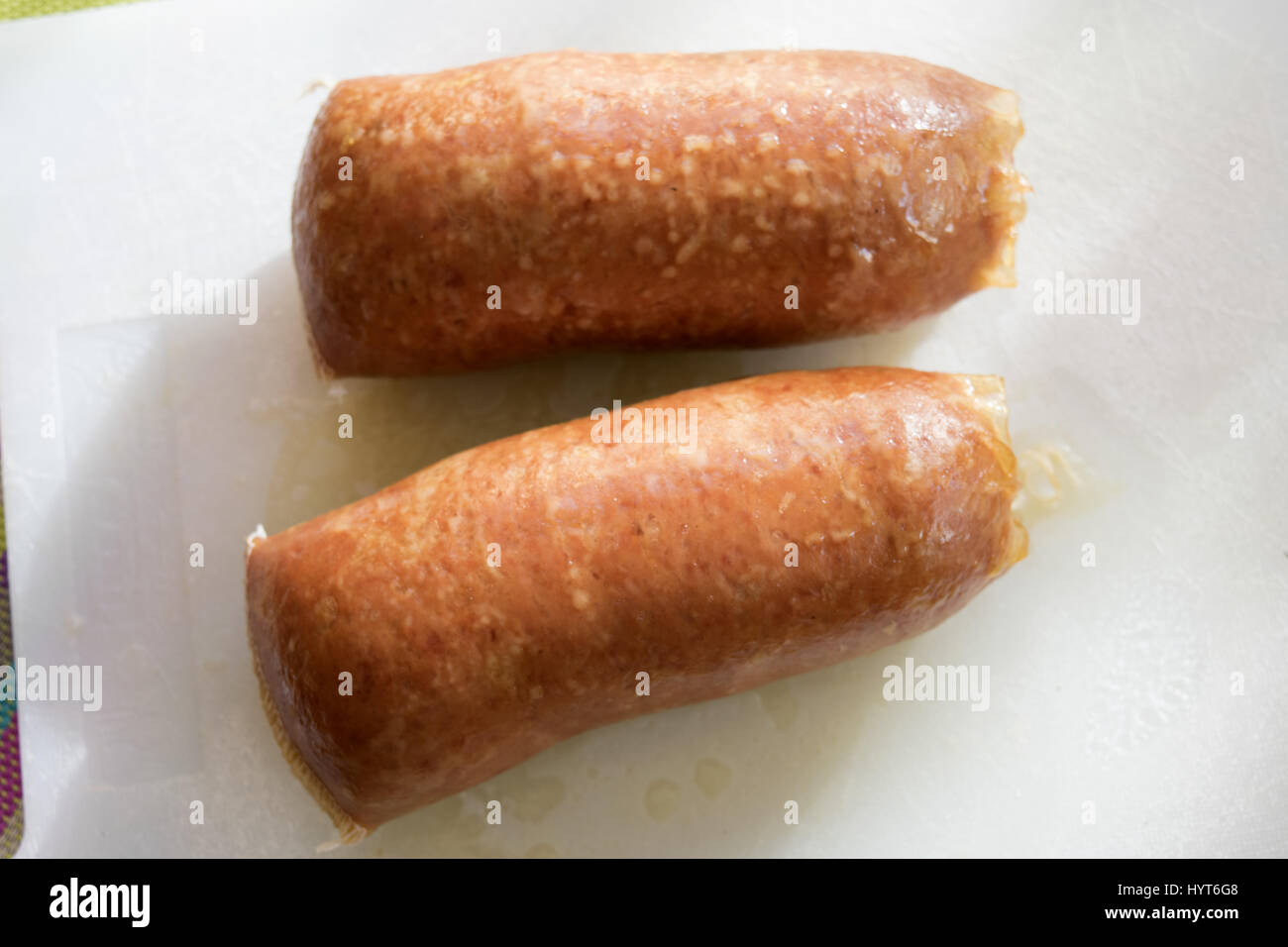Italian cotechino or gelatinous pork sausage in a natural casing Stock ...