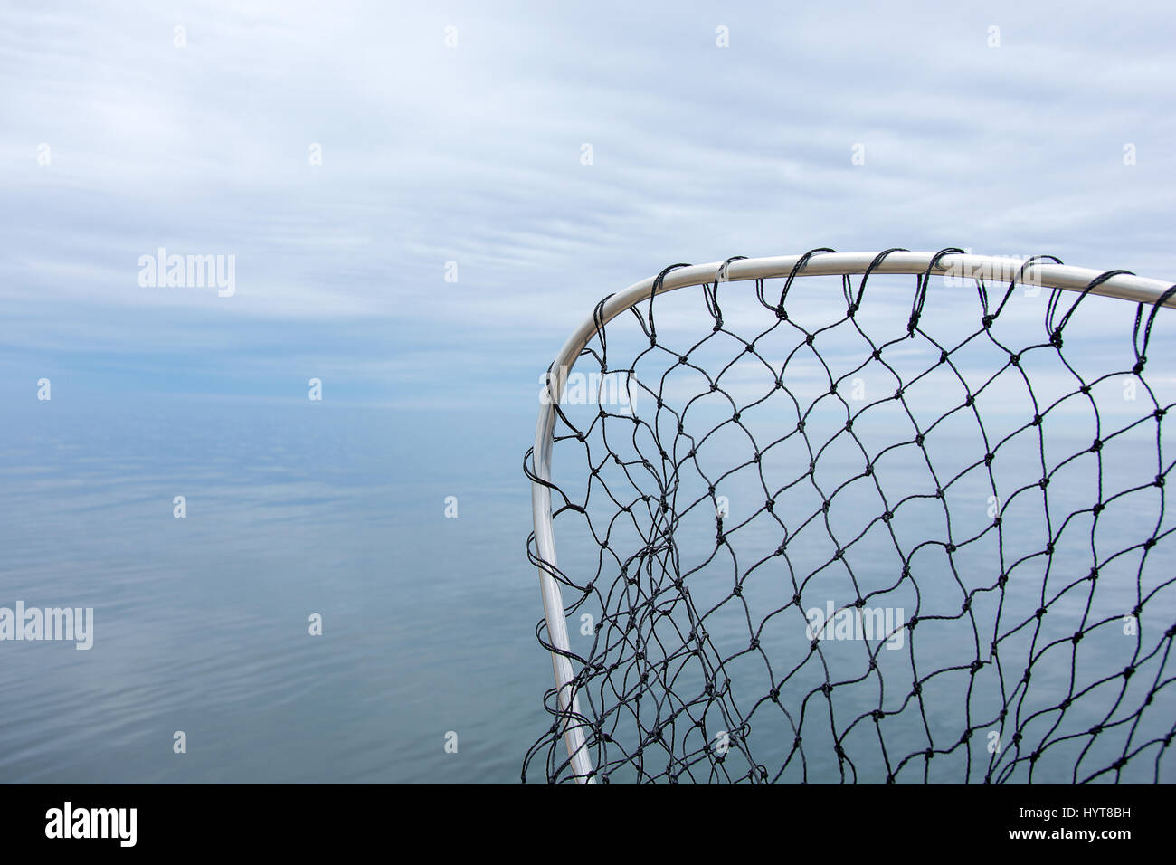 fishing net with lake background Stock Photo - Alamy