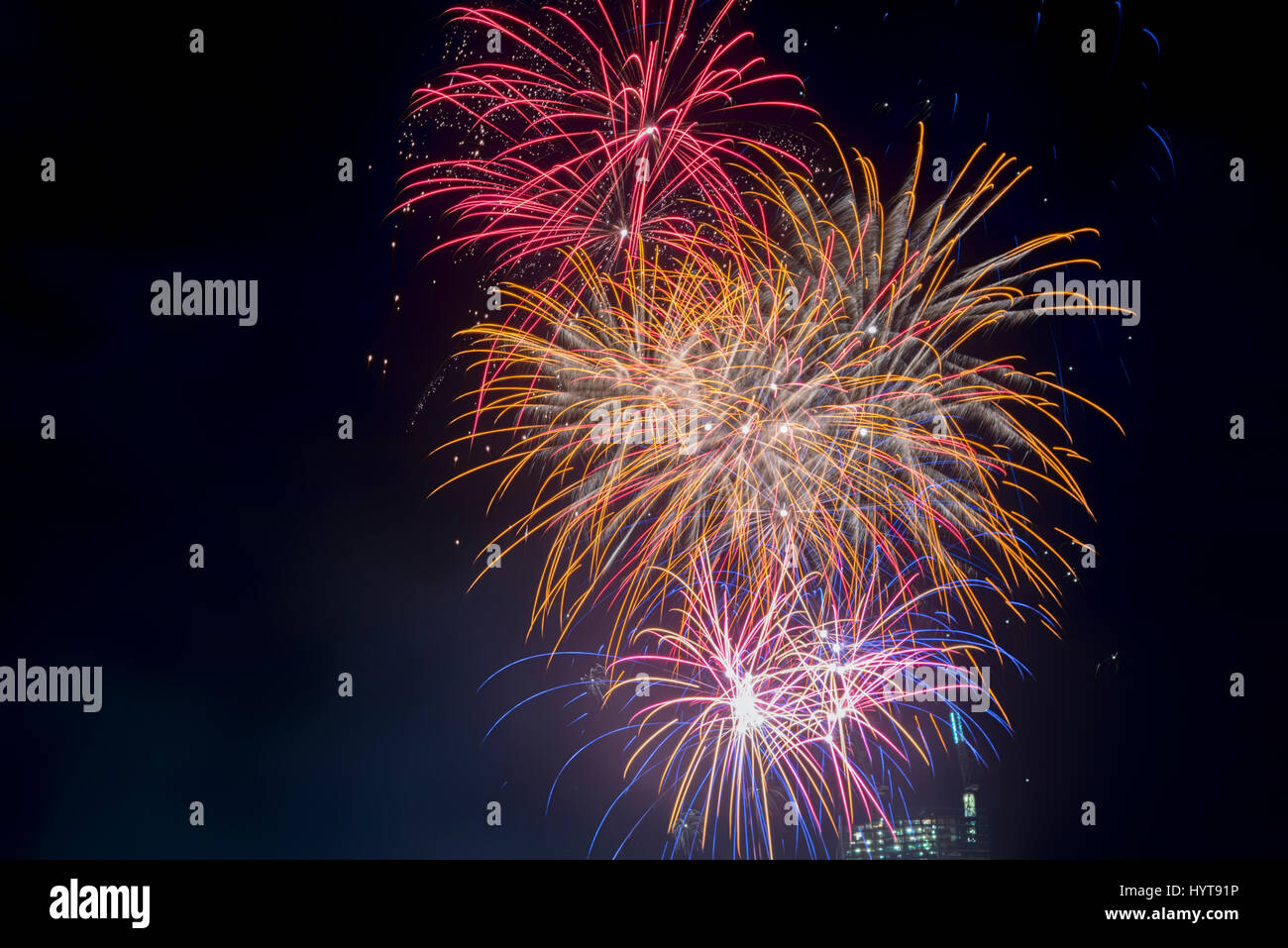 An explosion of multicolored fireworks at the Dockland's Winter ...