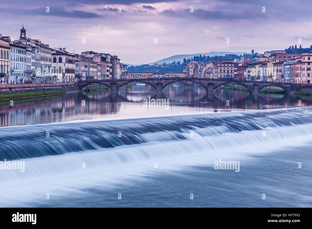 The Arno River flowing through Florence at sunrise.Italy Stock Photo ...