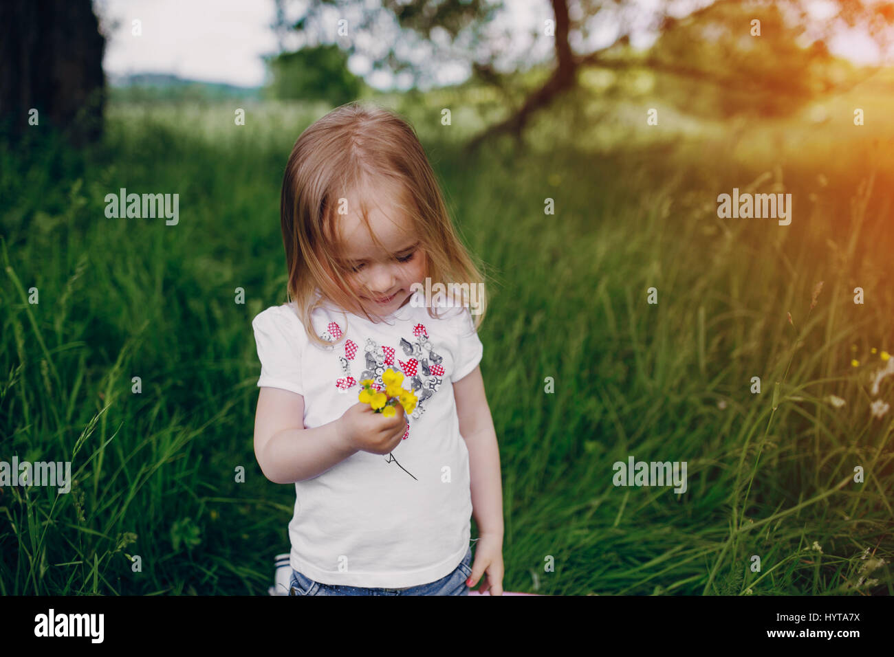 child near tree Stock Photo - Alamy