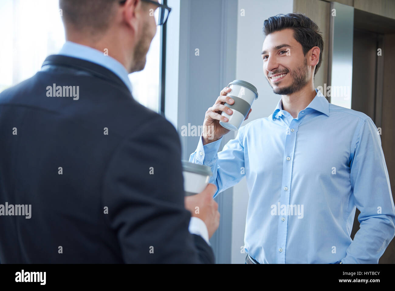 Sip of coffee at work Stock Photo - Alamy