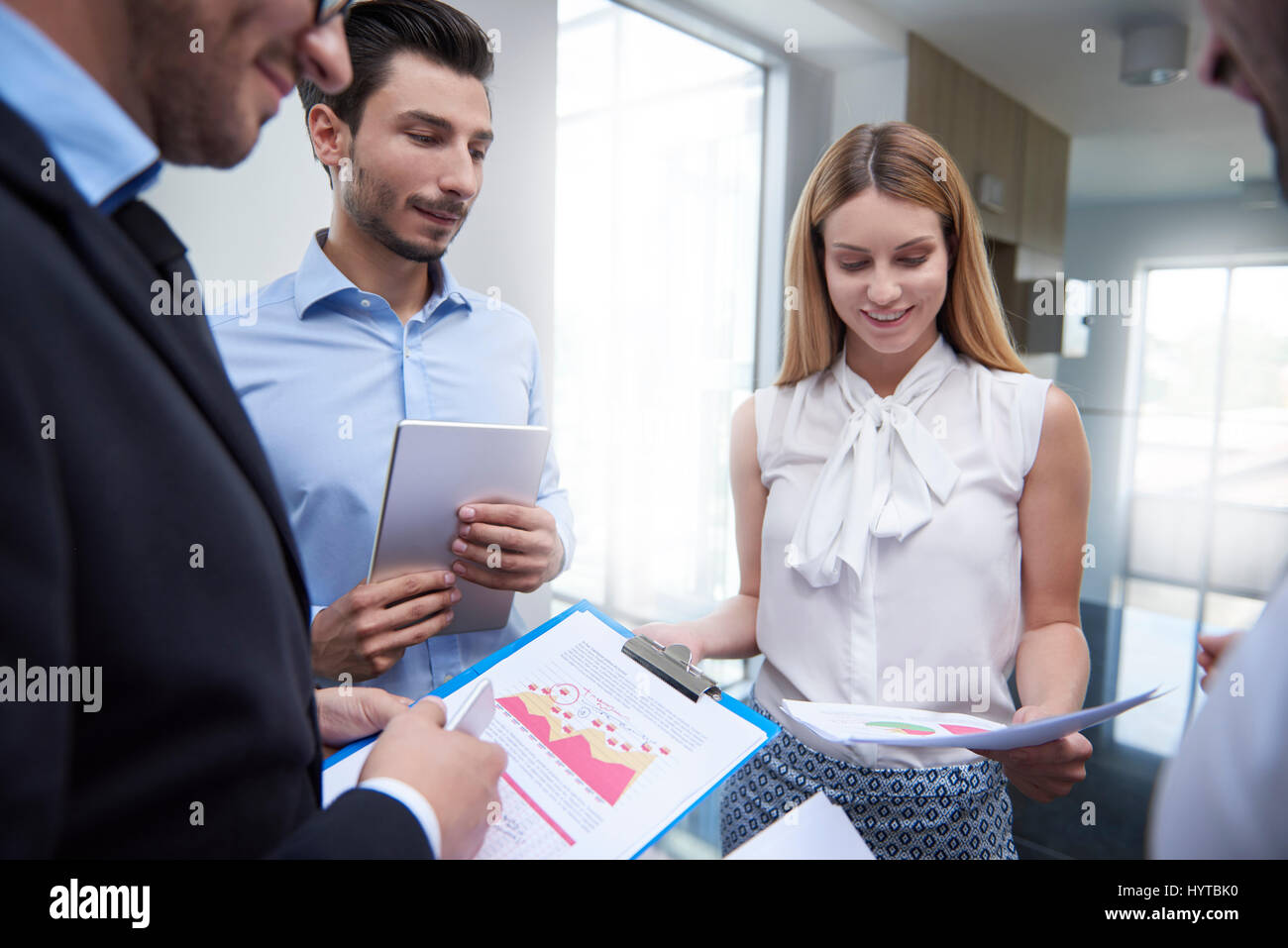 Discussing and analyzing important documents Stock Photo - Alamy