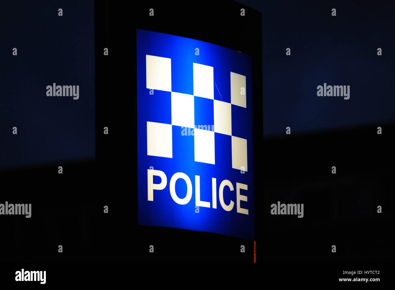 An illuminated police sign outside a Police Scotland headquarters ...