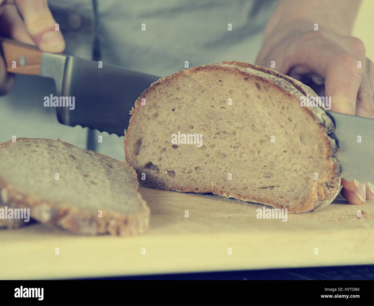 Male cutting bread hi-res stock photography and images - Alamy