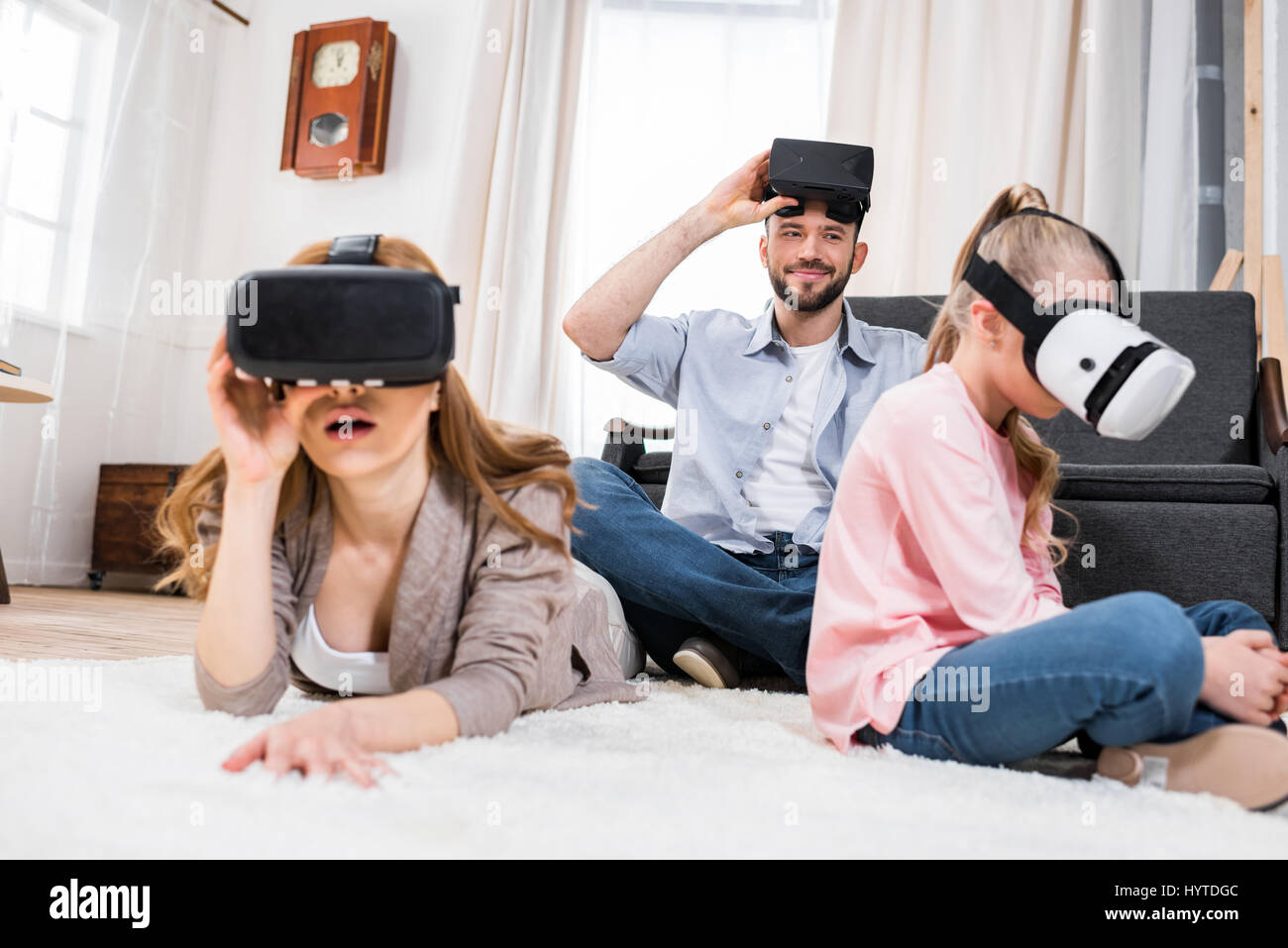 Shocked girl sitting on floor hi-res stock photography and images - Alamy