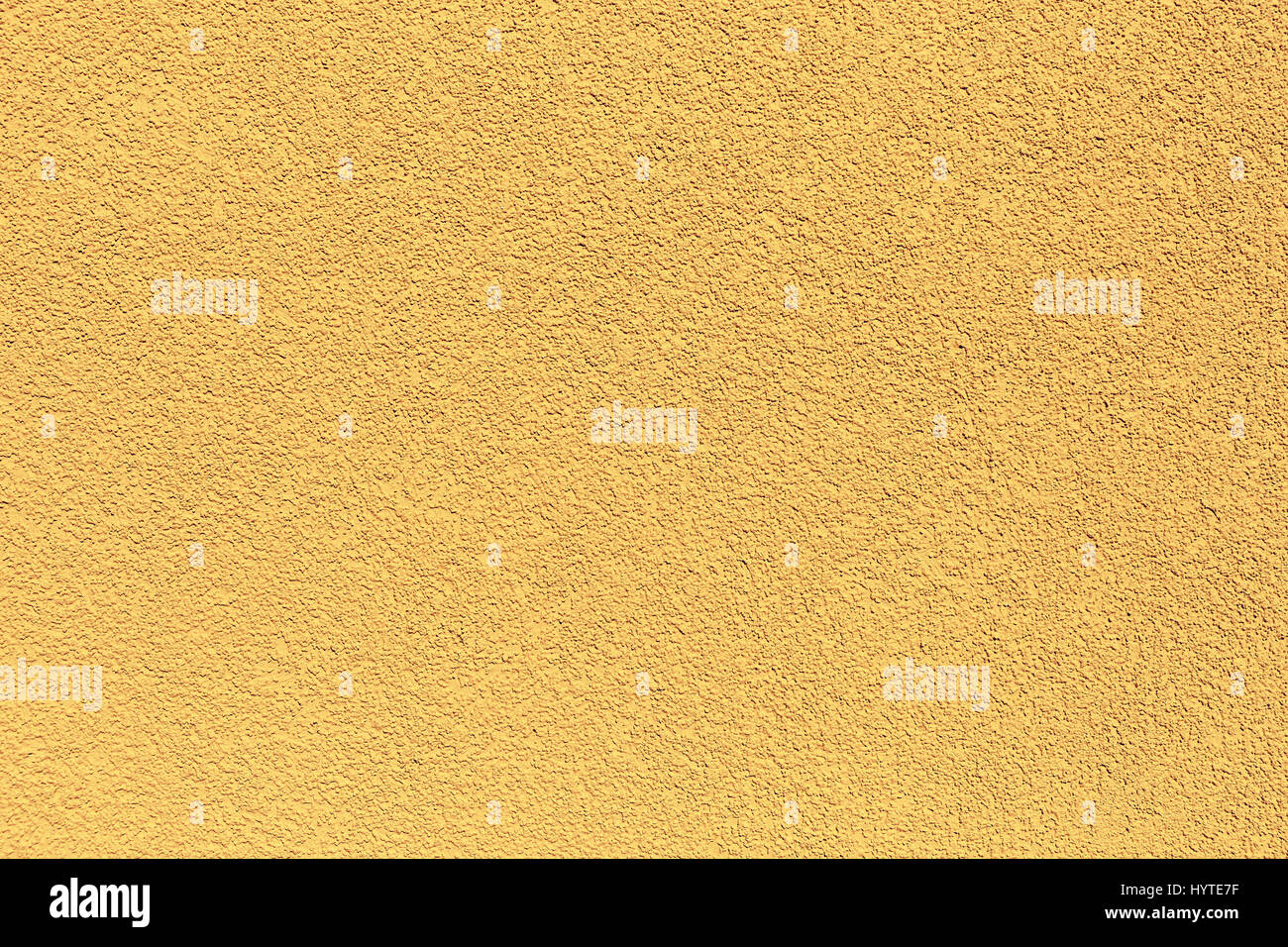 Yellow rugged plaster wall, texture or background Stock Photo - Alamy