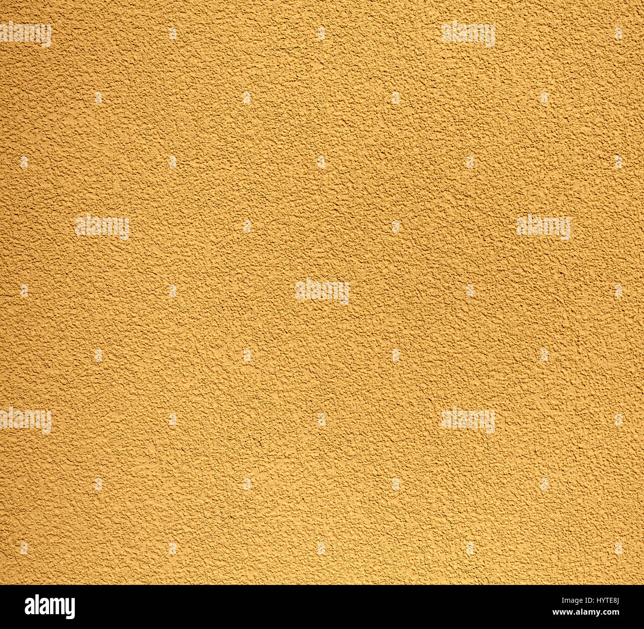 Yellow rugged plaster wall, texture or background Stock Photo - Alamy
