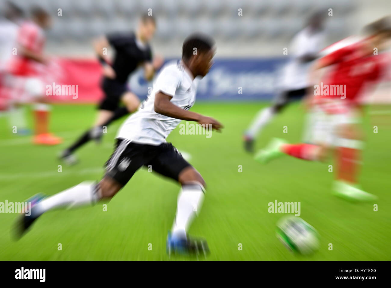 Football in movement hi-res stock photography and images - Alamy
