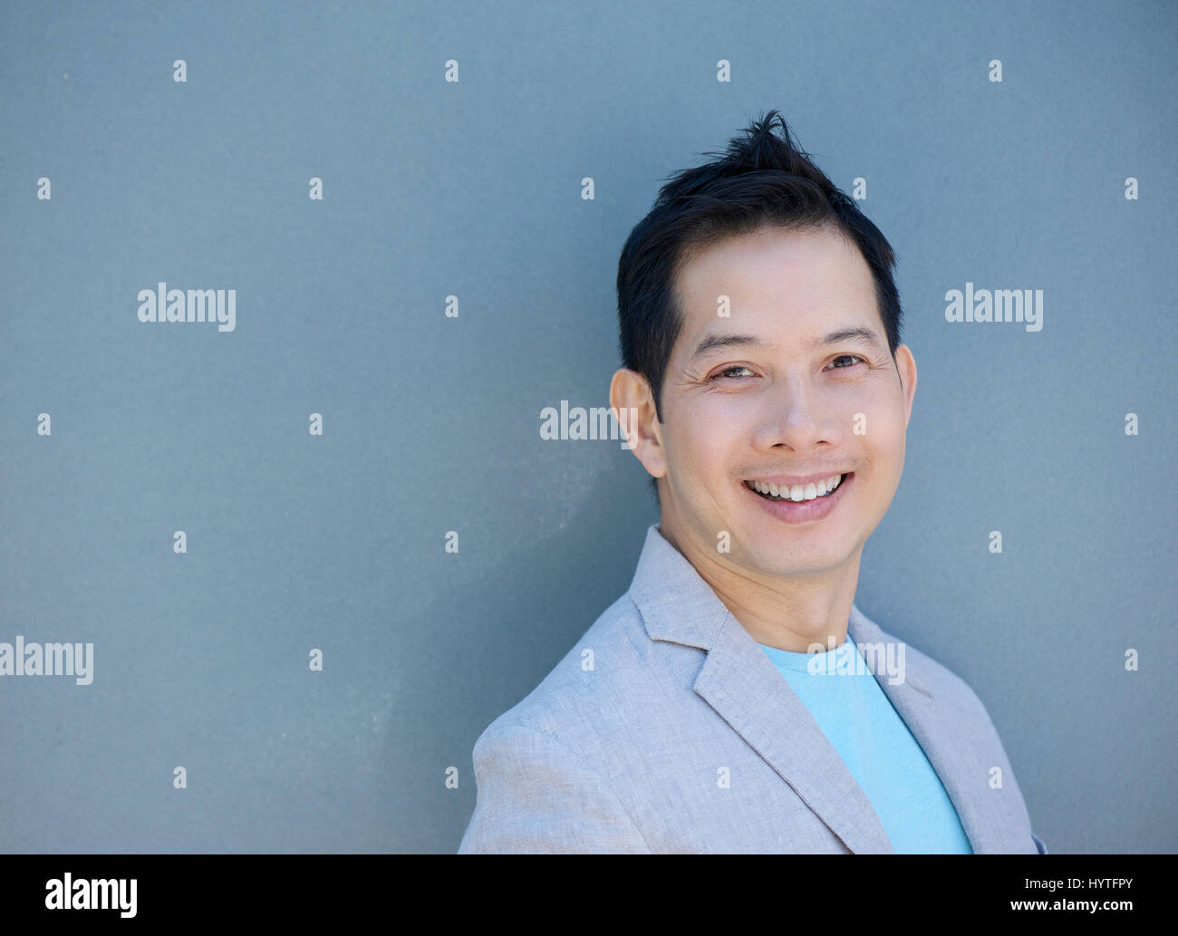 Close up smiling chinese man hi-res stock photography and images - Alamy