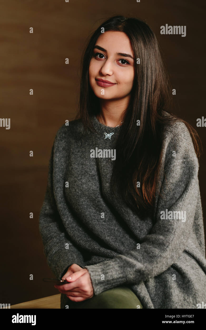 beautiful young brunette woman close-up portrait in the room Stock ...