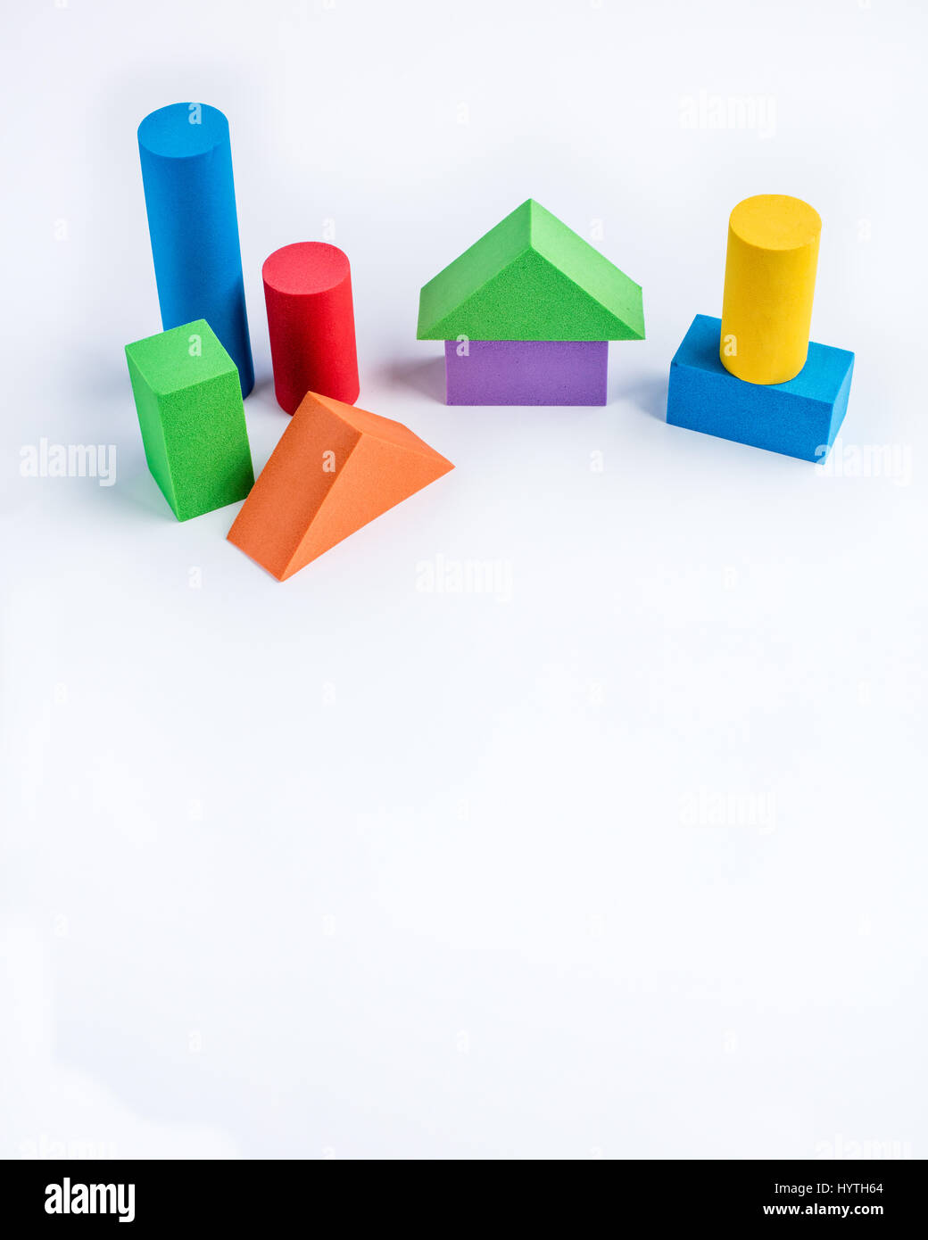 Vertical view of brightly colored soft blocks stacked to show graph ...