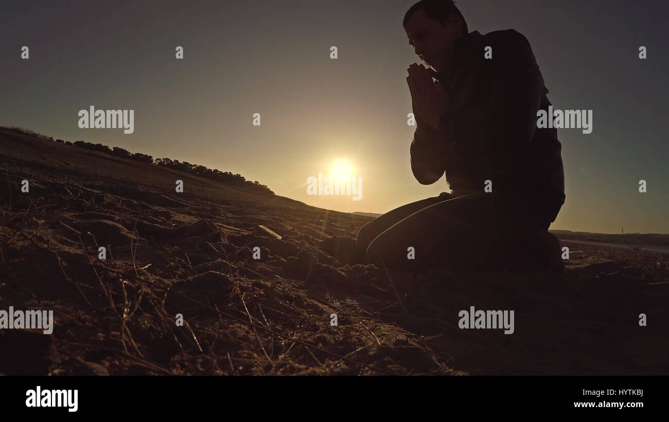 man praying god sunset sitting silhouette sun sunlight the religion ...