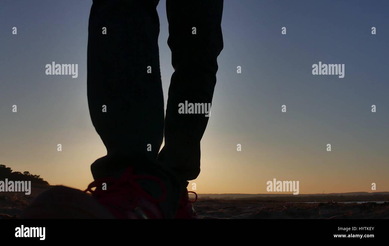travel. Man is walking at sunset silhouette journey travel lifestyle ...