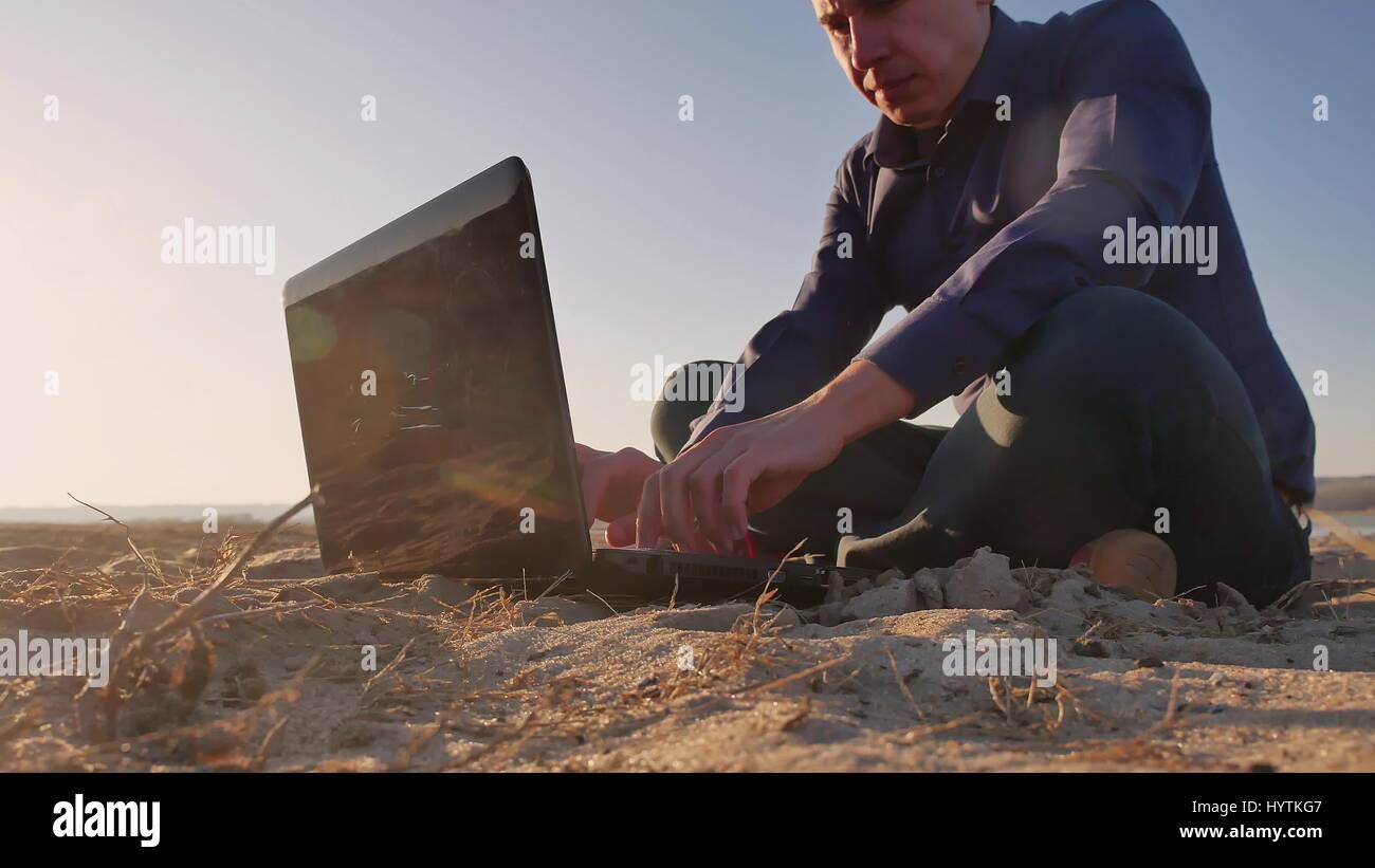 Freelancing. Man working on laptop silhouette in nature, businessman freelancer Freelancing ...