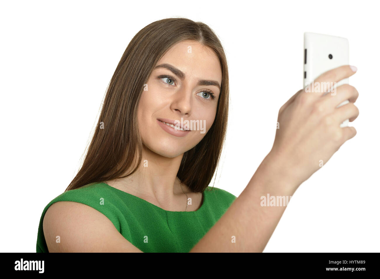 Beautiful girl with mobile phone on a white background Stock Photo - Alamy