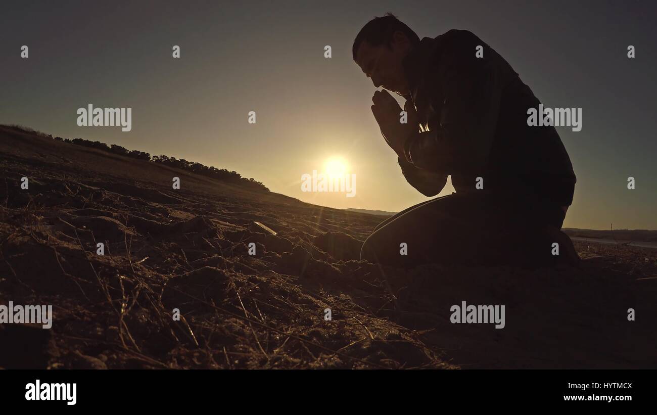 man praying god sunset sitting sun silhouette sunlight the religion ...