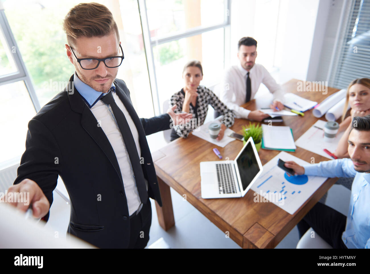 Business meeting looking at data hi-res stock photography and images ...