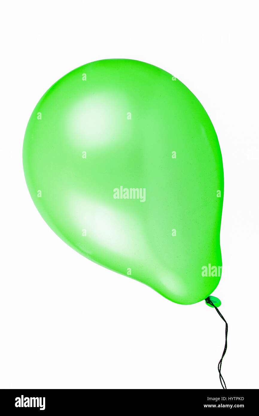 Flying single green balloon isolated on white background Stock Photo ...