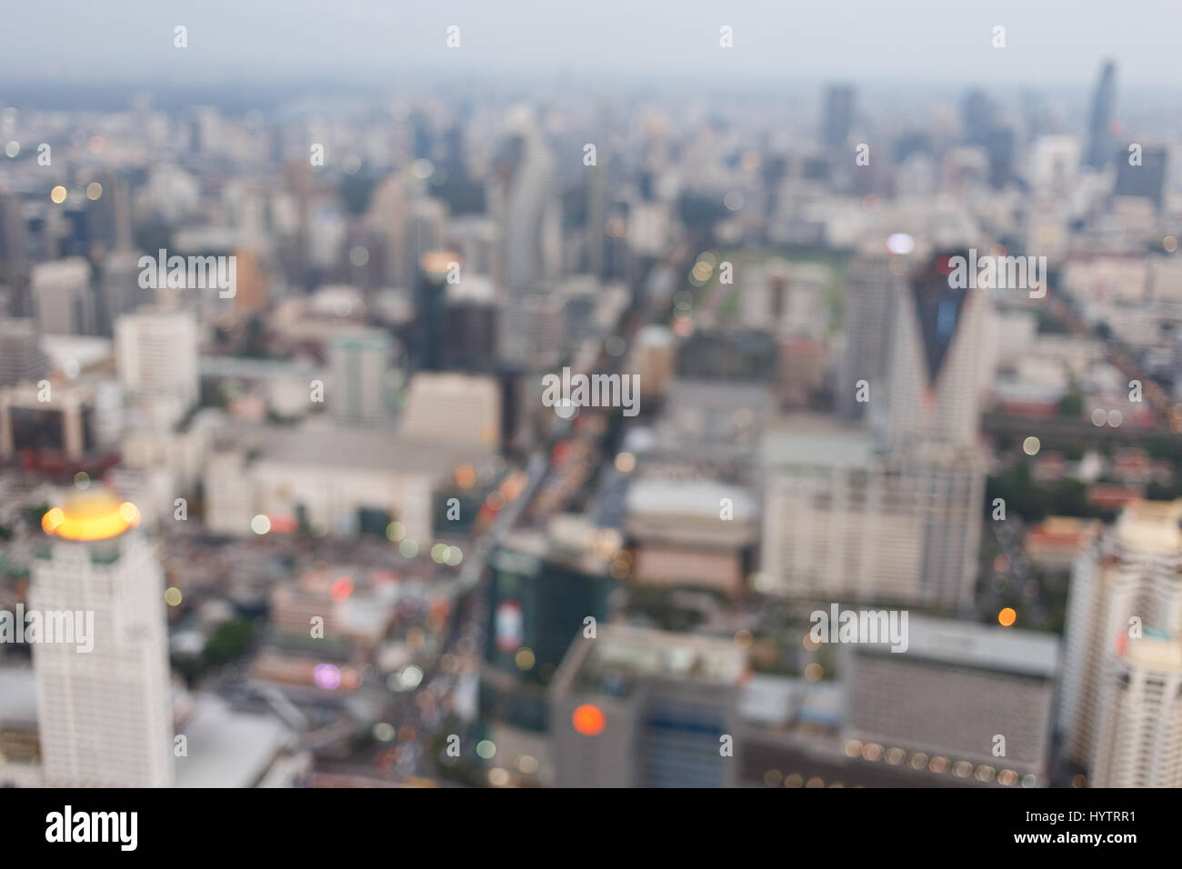 Blurred photo of modern buildings with lights Stock Photo - Alamy