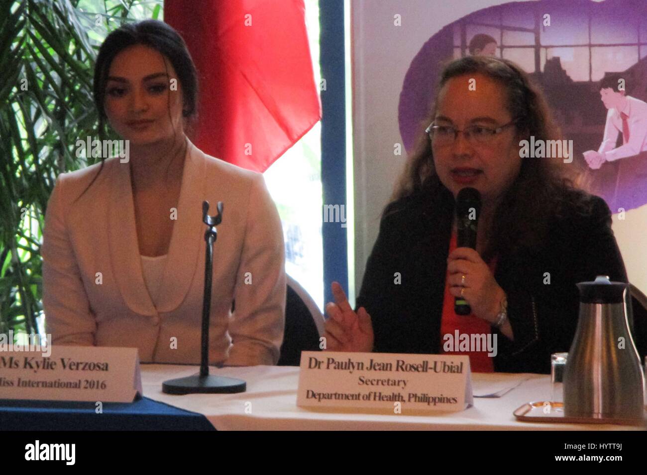 Department of Health Secretary Paulyn Ubial, right, speaks, as Miss International 2016 Kylie ...