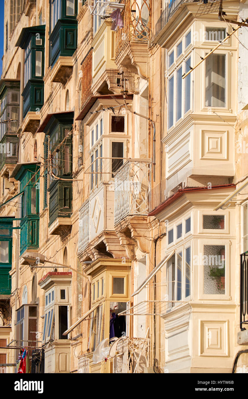 A traditional Maltese style different colored balconies in Valletta ...
