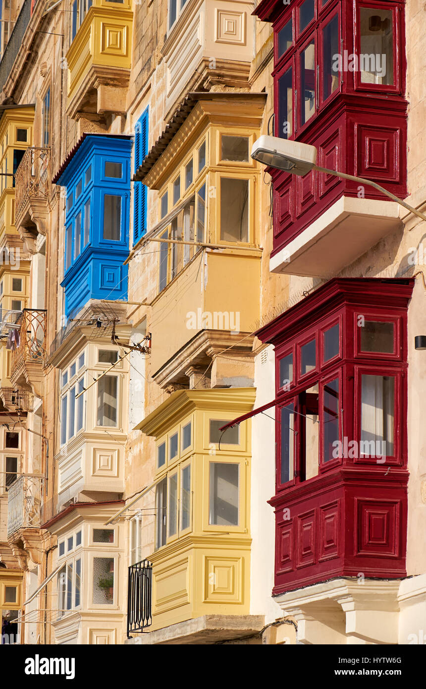 A traditional Maltese style different colored balconies in Valletta ...