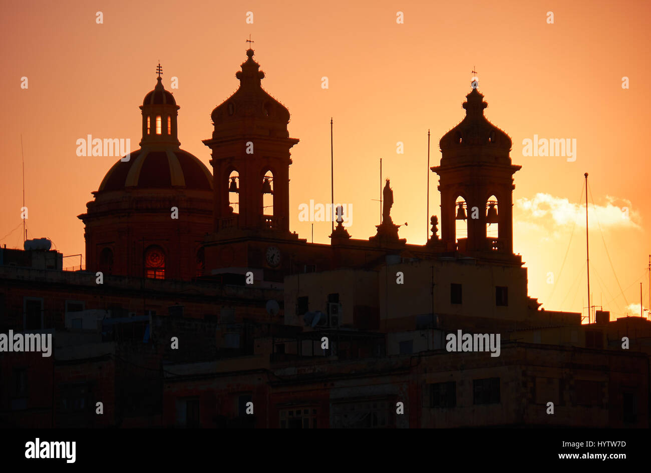 Isla Basilica (Our Lady of Victories Parish Church) at sunset against ...